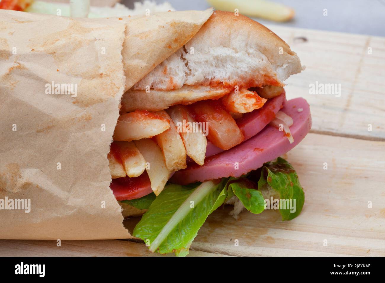 South African submarine sandwich with chips and meat known as a Gatsby ...