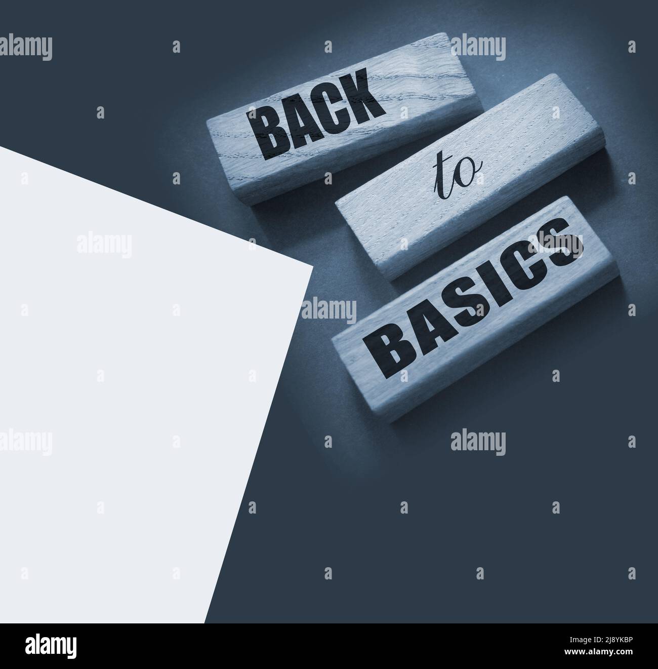 The words back to basics made of letters on wooden blocks. back to ...