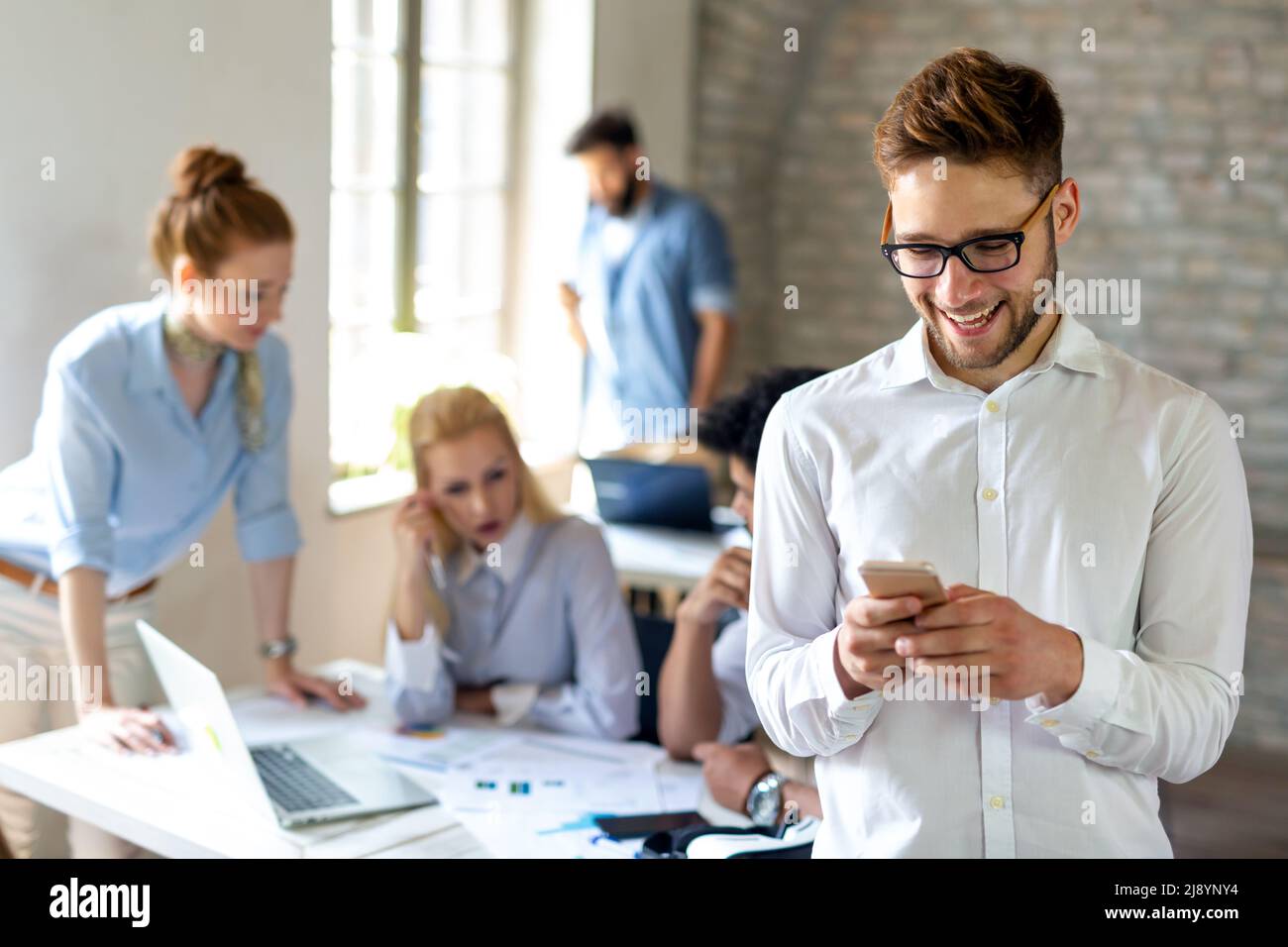 Group of success people working together at corporate workplace ...