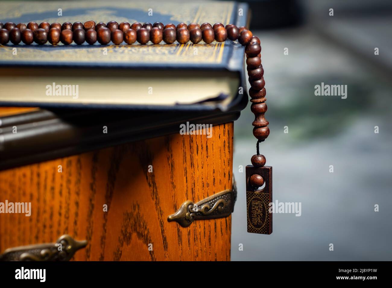 Background wallpaper of rosary beads (tasbih) and The holy coran Quran ...