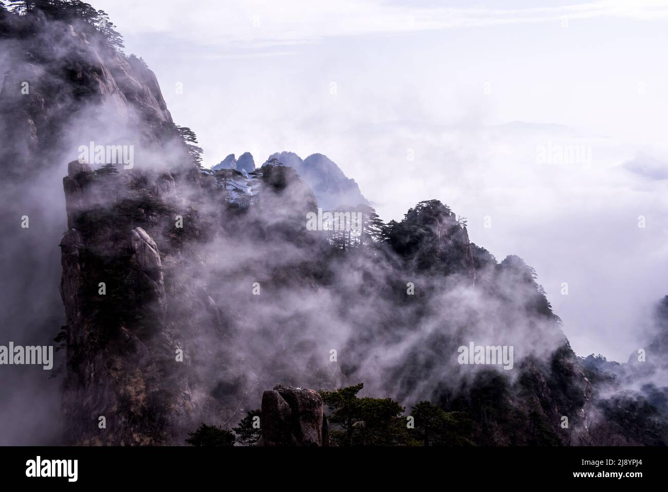 Wonderful and curious sea of clouds at beautiful Huangshan mountain landscape in China Stock ...