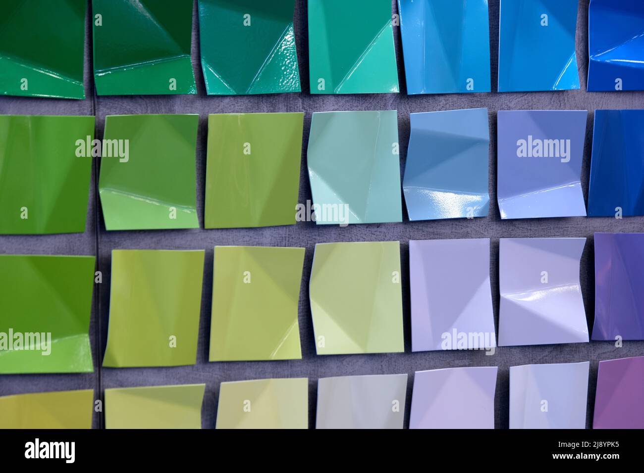Colorful metal samples sheets. Various steel color samplers look like ...