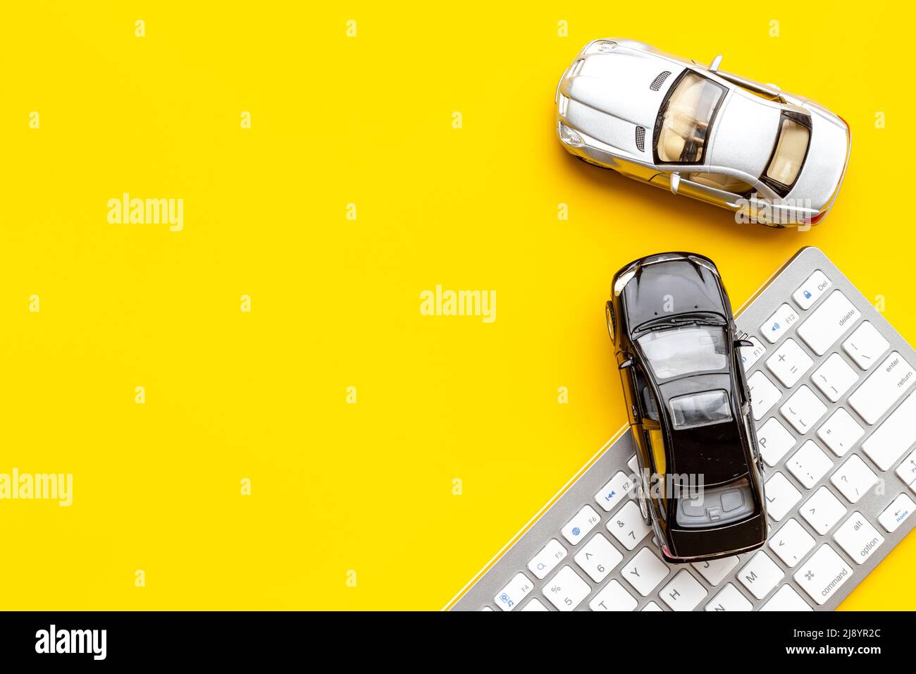 Car for sale concept. Toy car near computer keyboard Stock Photo - Alamy