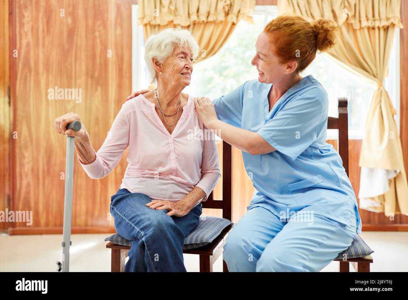 Elderly woman with cane hi-res stock photography and images - Alamy