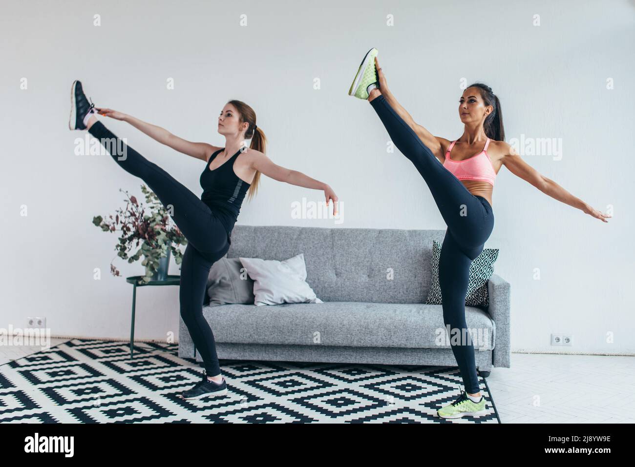 Standing glute stretch hi-res stock photography and images - Alamy