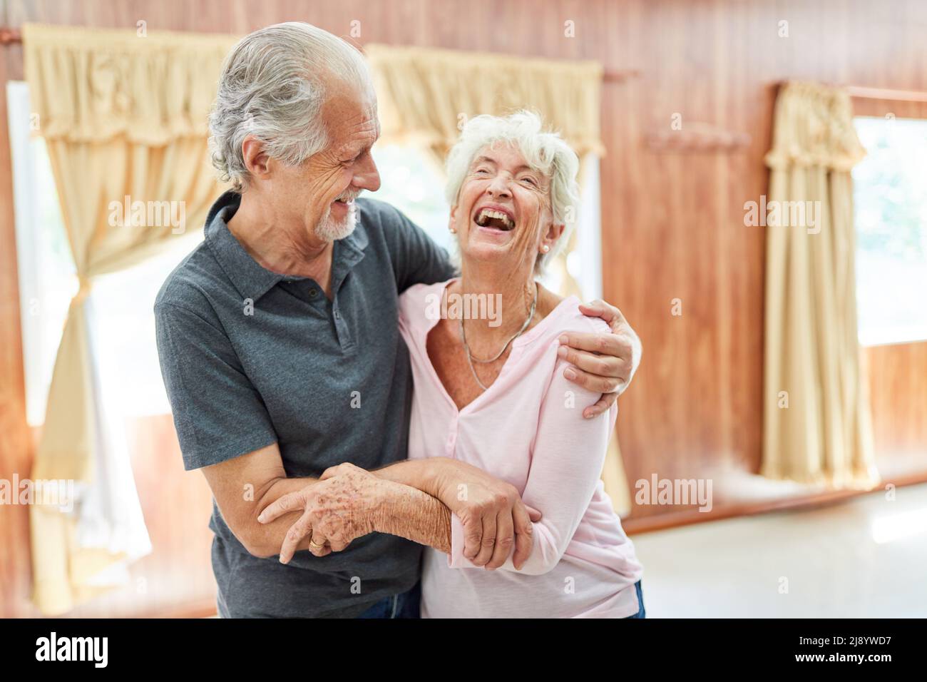Senior couple in love having fun and laughing together as concept of ...