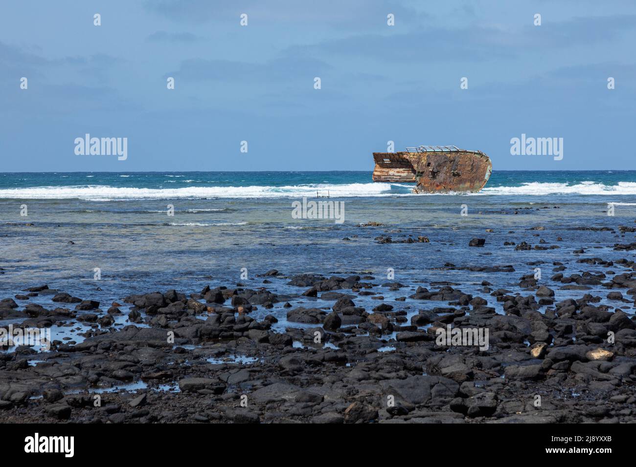 A rusting fishing boat wreck at Baía da Parda, Sal Island, Cape Verde ...