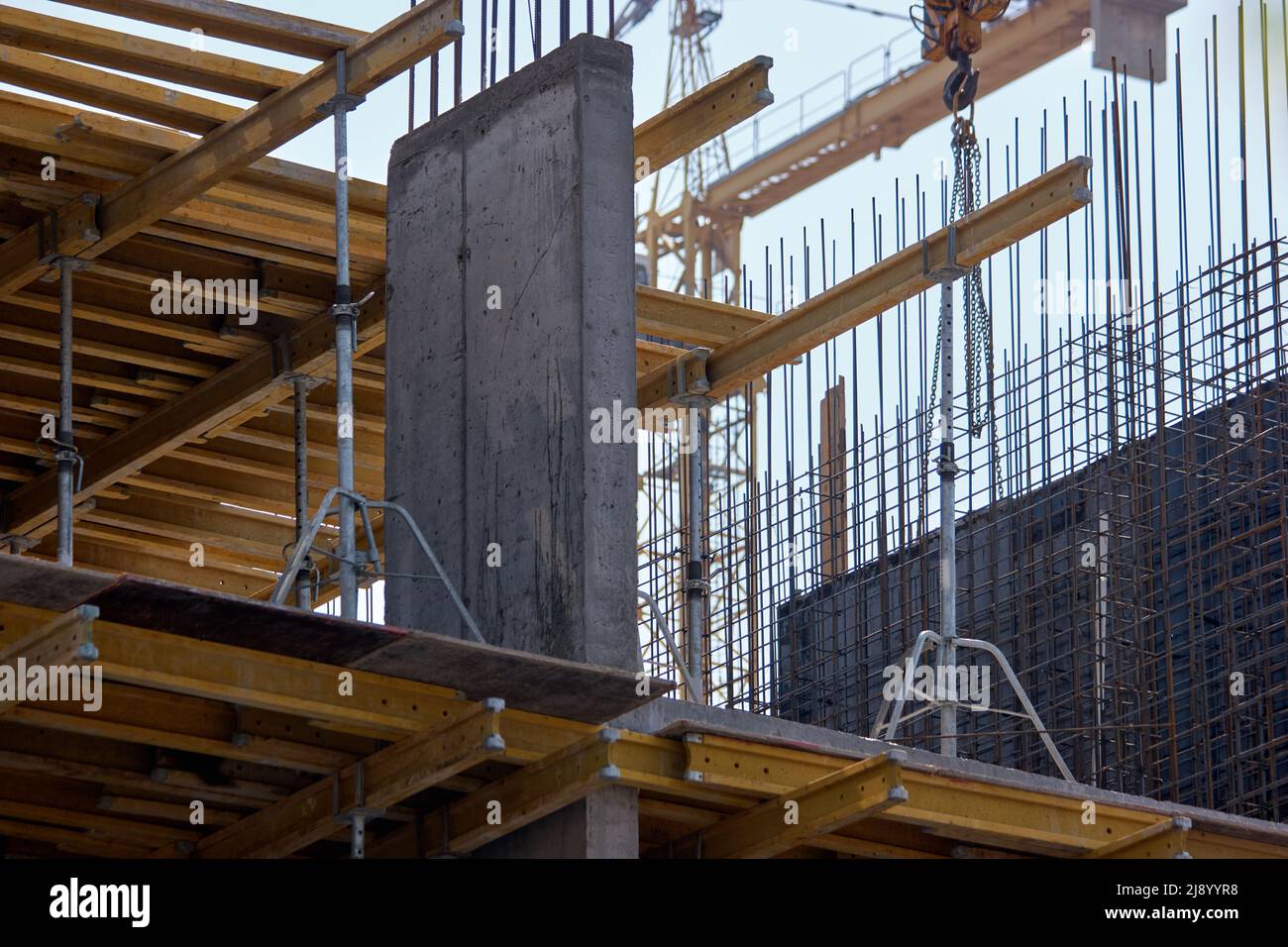 Unfinished building construction. Metal skyscraper frame. Construction ...