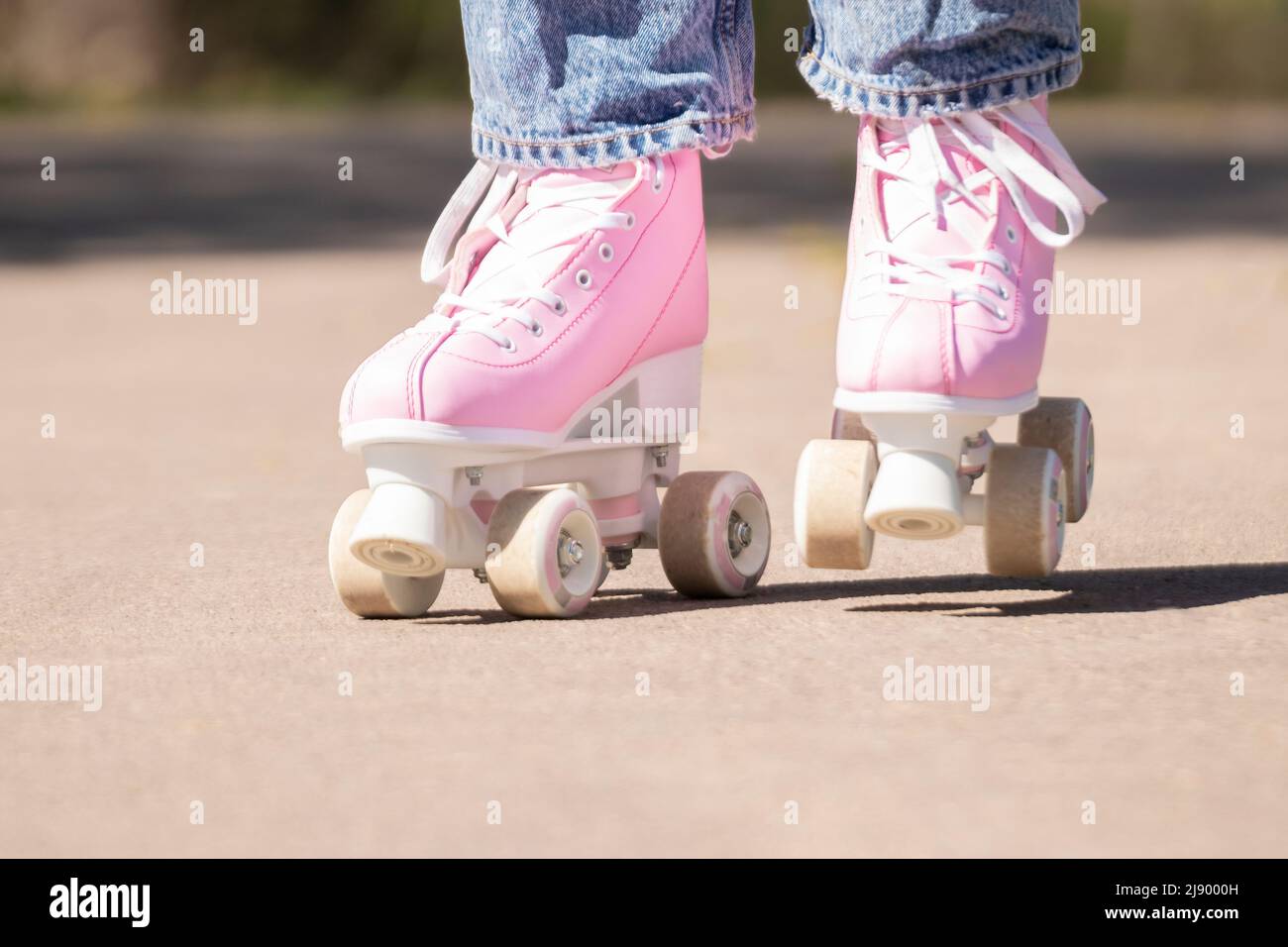 Pink rollerskates hi-res stock photography and images - Alamy