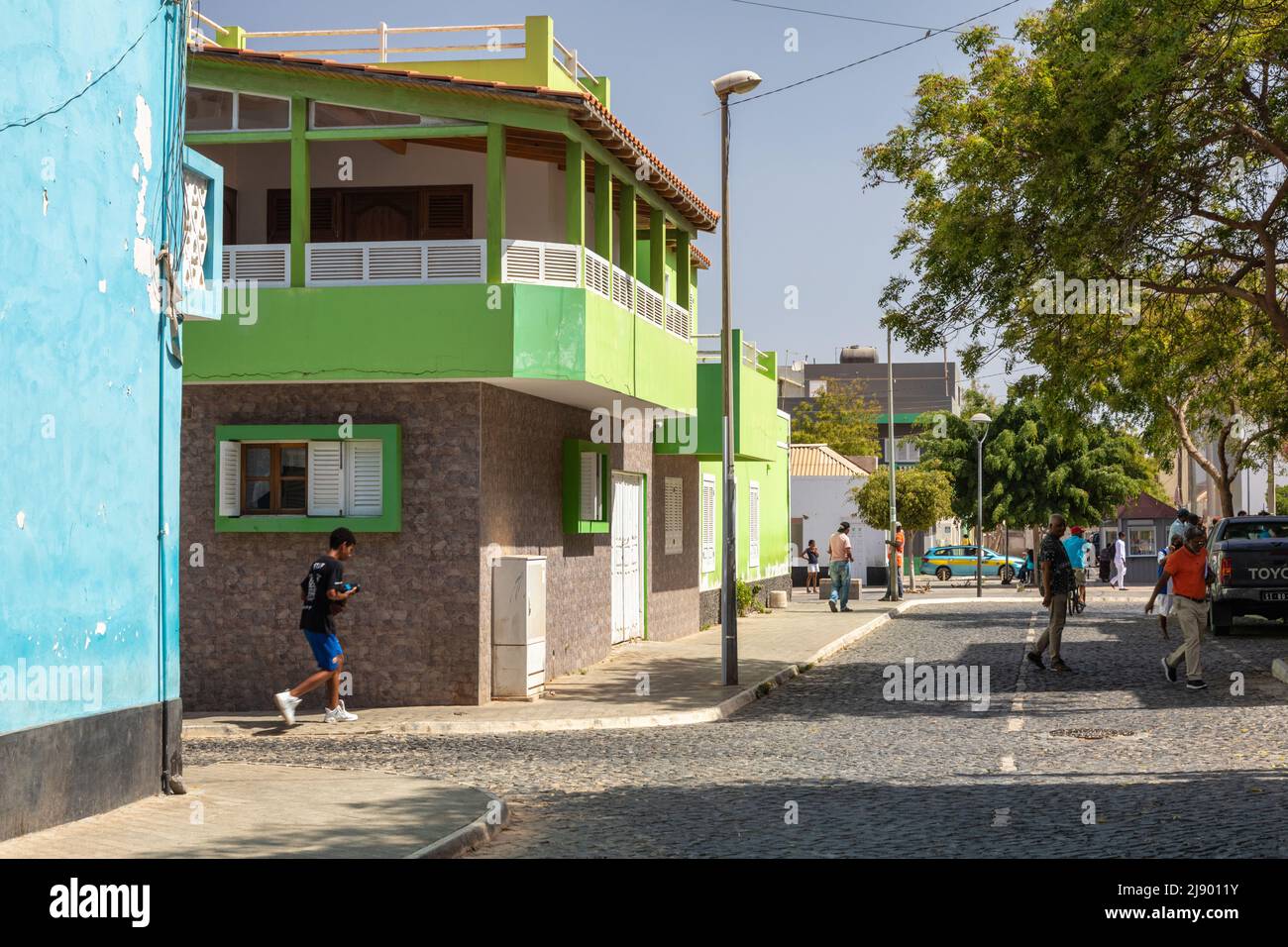 Traditional colourful buildings in a street scene in Espargos, Sal ...