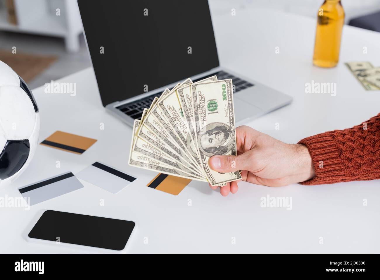 Hand holding fan cards hi-res stock photography and images - Alamy