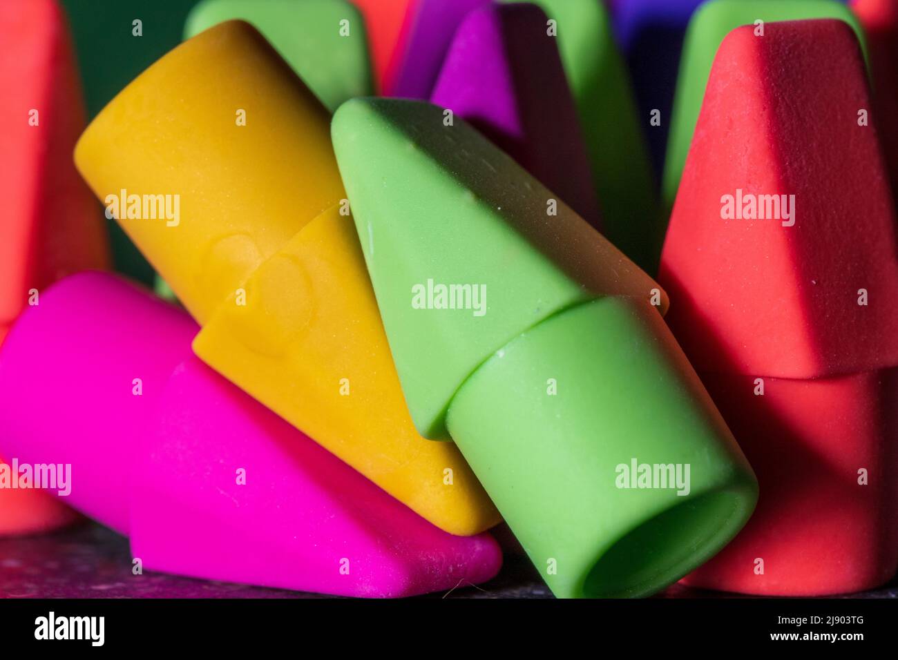 Macro image of colorful pencil erasers Stock Photo - Alamy