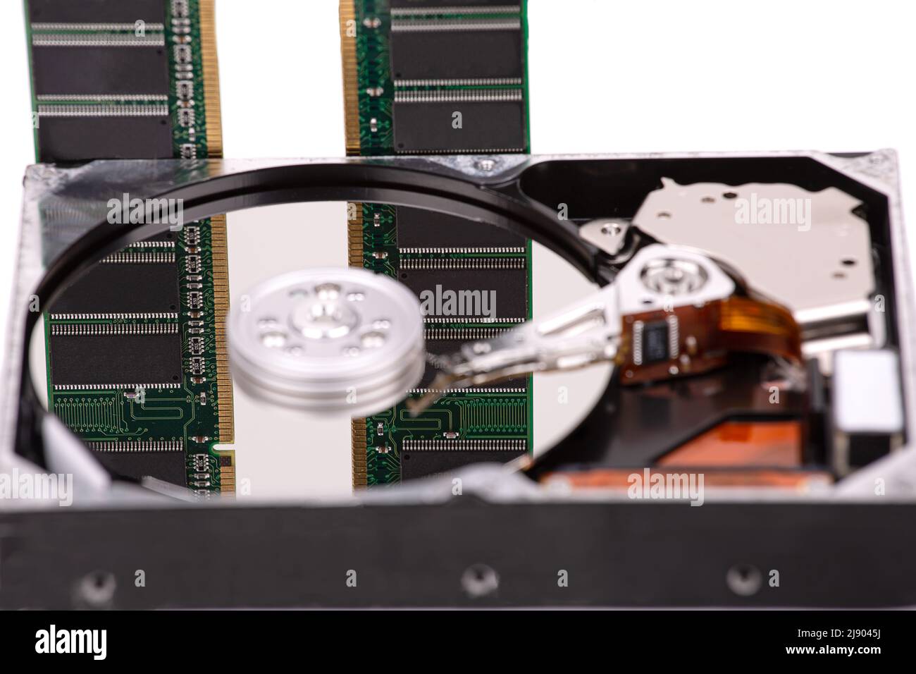 The RAM modules are reflected in the plate of the open hard disk Stock ...