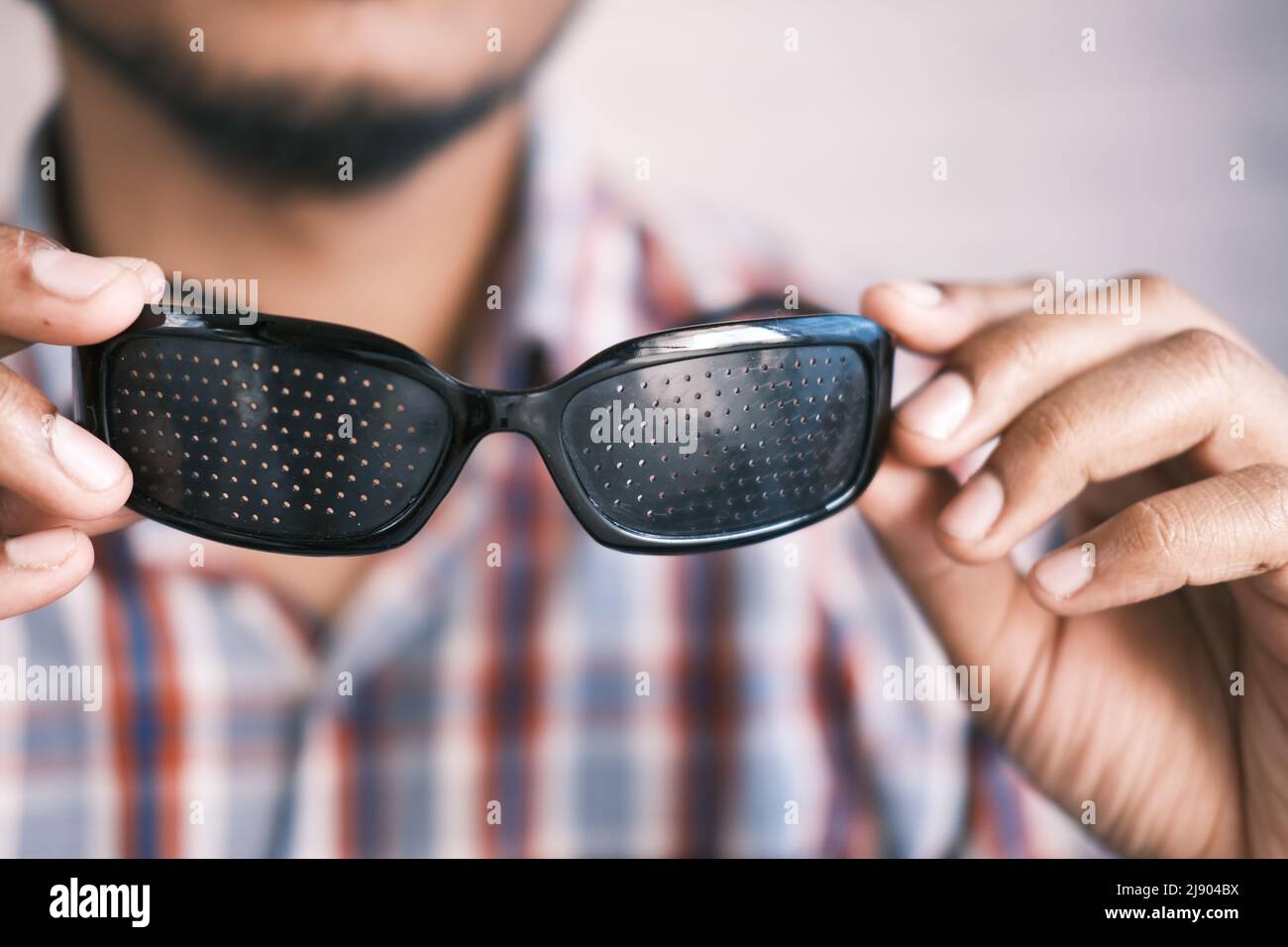 Eye perforation hi-res stock photography and images - Alamy