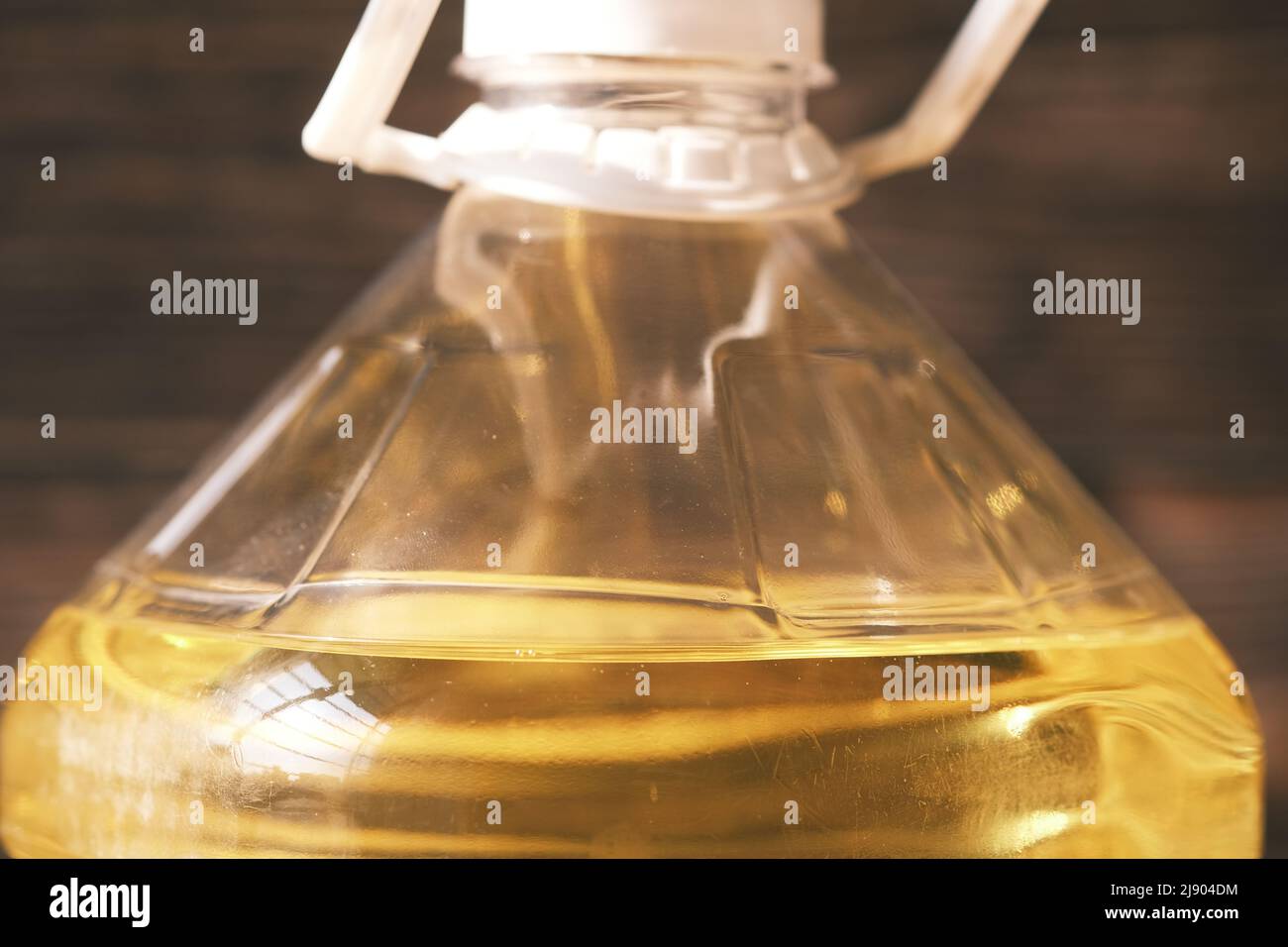 Palm oil in a plastic container close up Stock Photo - Alamy