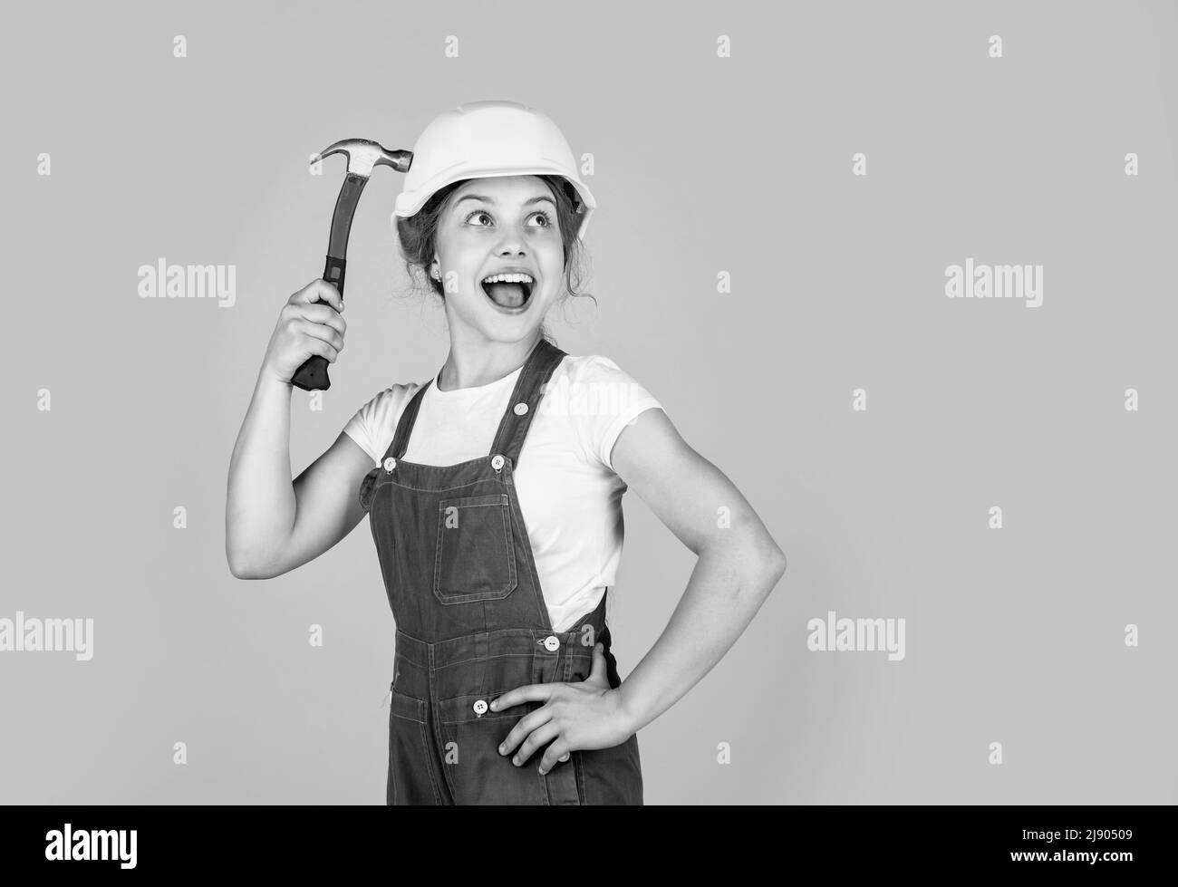 she can fix anything. future engineer. happy kid use hammer repairing ...