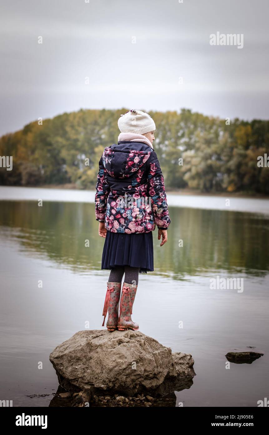 little child enjoying freedom and loneliness Stock Photo - Alamy