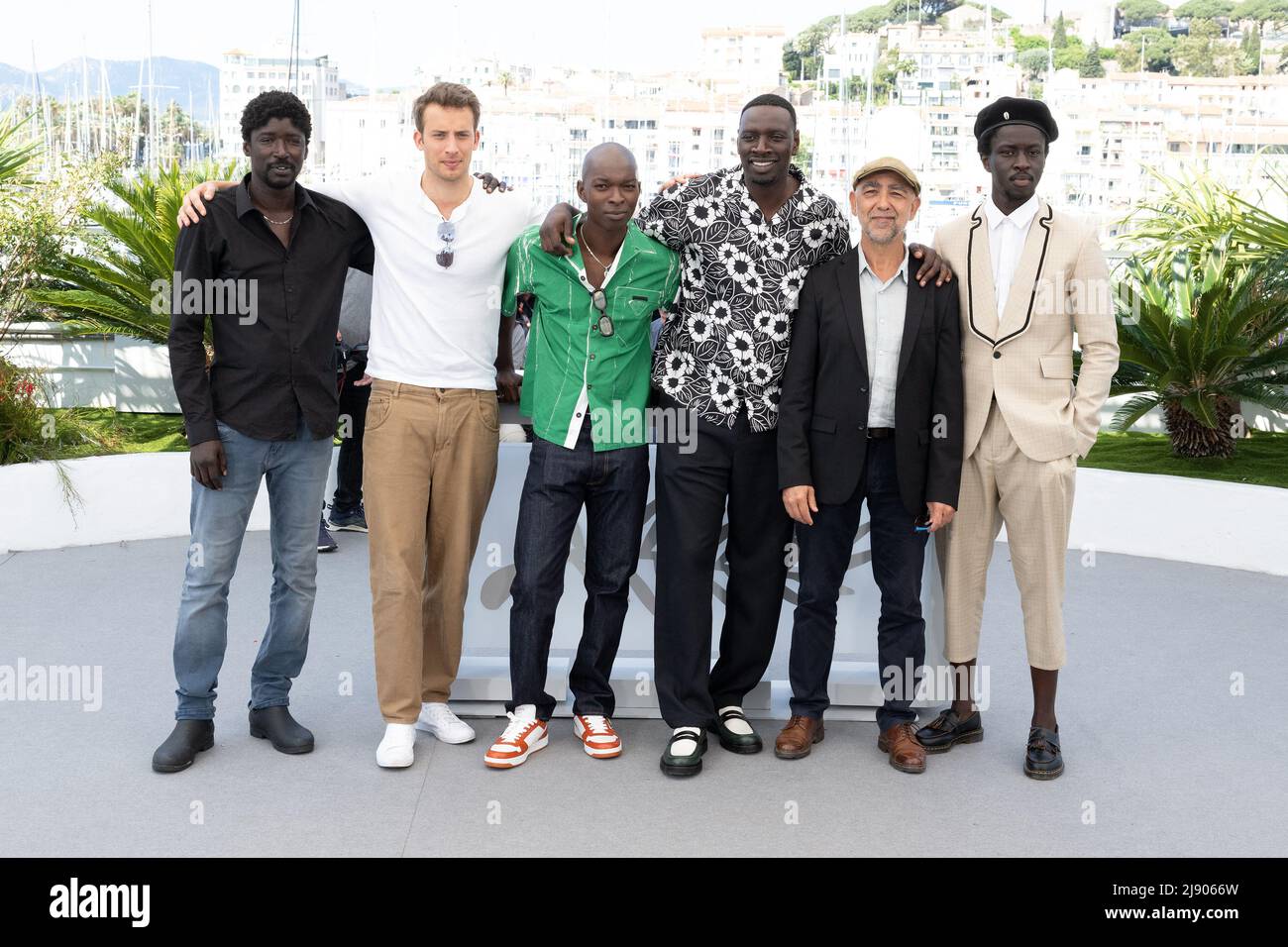 Cannes, France. 19th May, 2022. Alassane Sy, Jonas Bloquet, Alassane ...