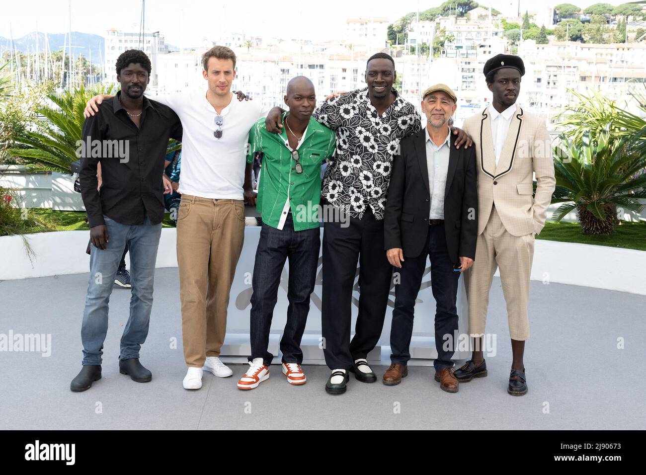 Cannes, France. 19th May, 2022. Alassane Sy, Jonas Bloquet, Alassane ...