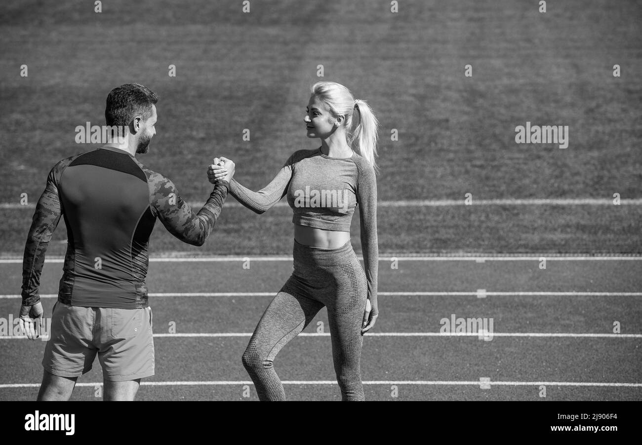 celebrate team win with gesture of shake hand. after exercising or ...