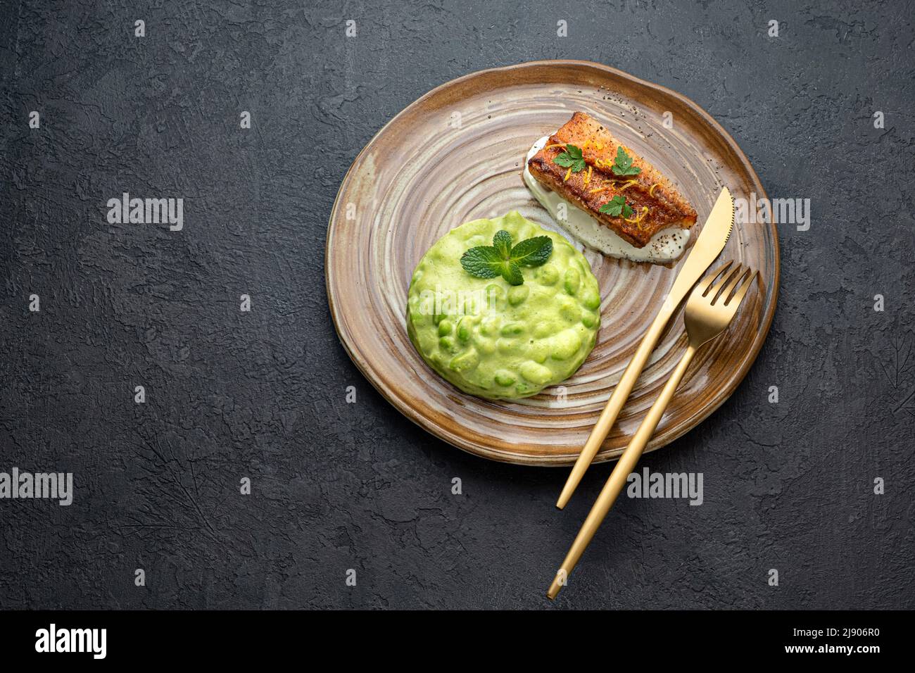 Pan fried ocean perch with edamame, restaurant dish Stock Photo - Alamy