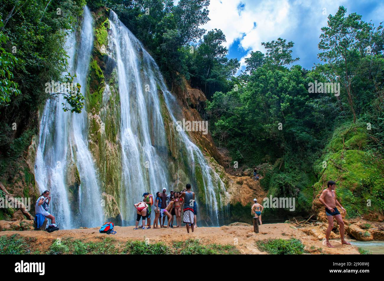 Tourists in the scenic cascade of El Limon waterfall in jungles of ...