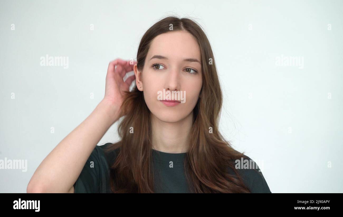 The girl nods in agreement, gives a positive answer with a satisfied ...