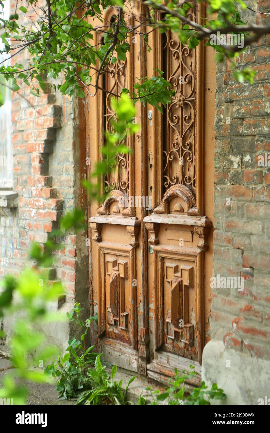 Entrance door of an old residential building Stock Photo - Alamy