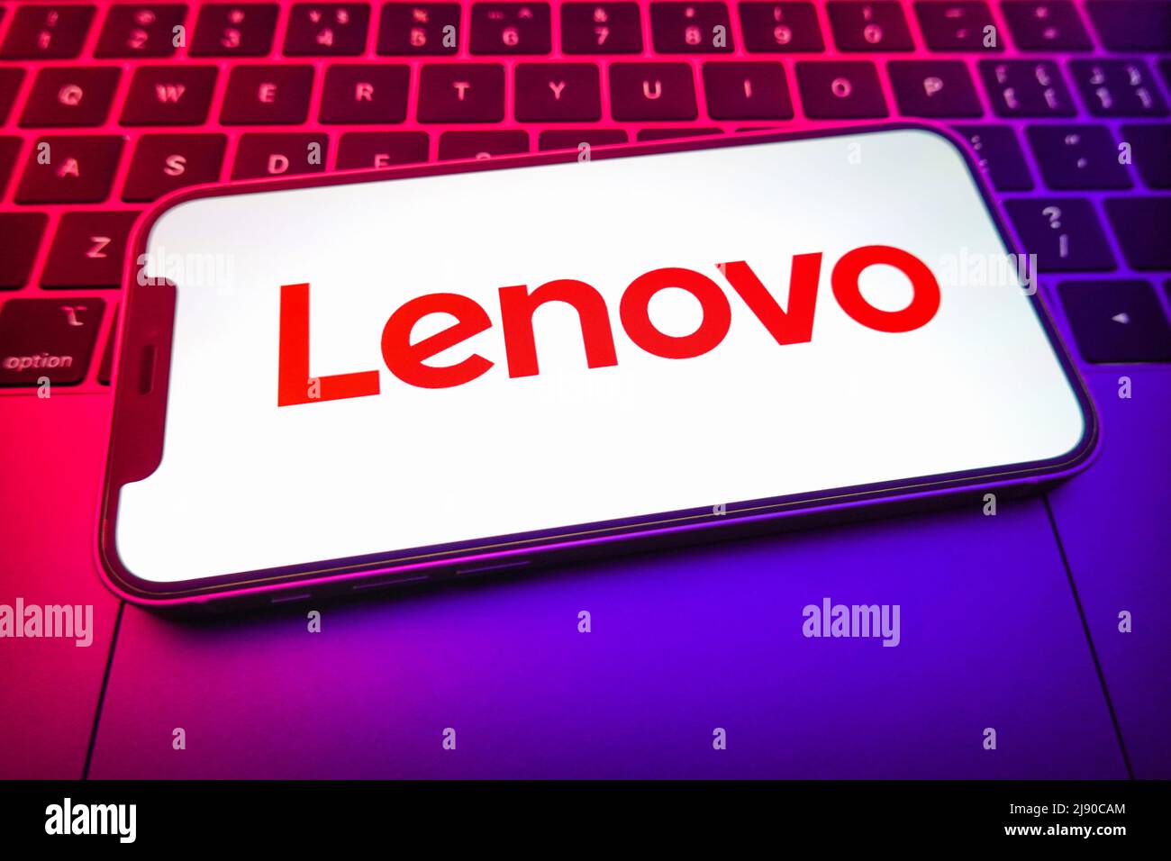 In this photo illustration, a Lenovo logo is displayed on the screen of ...