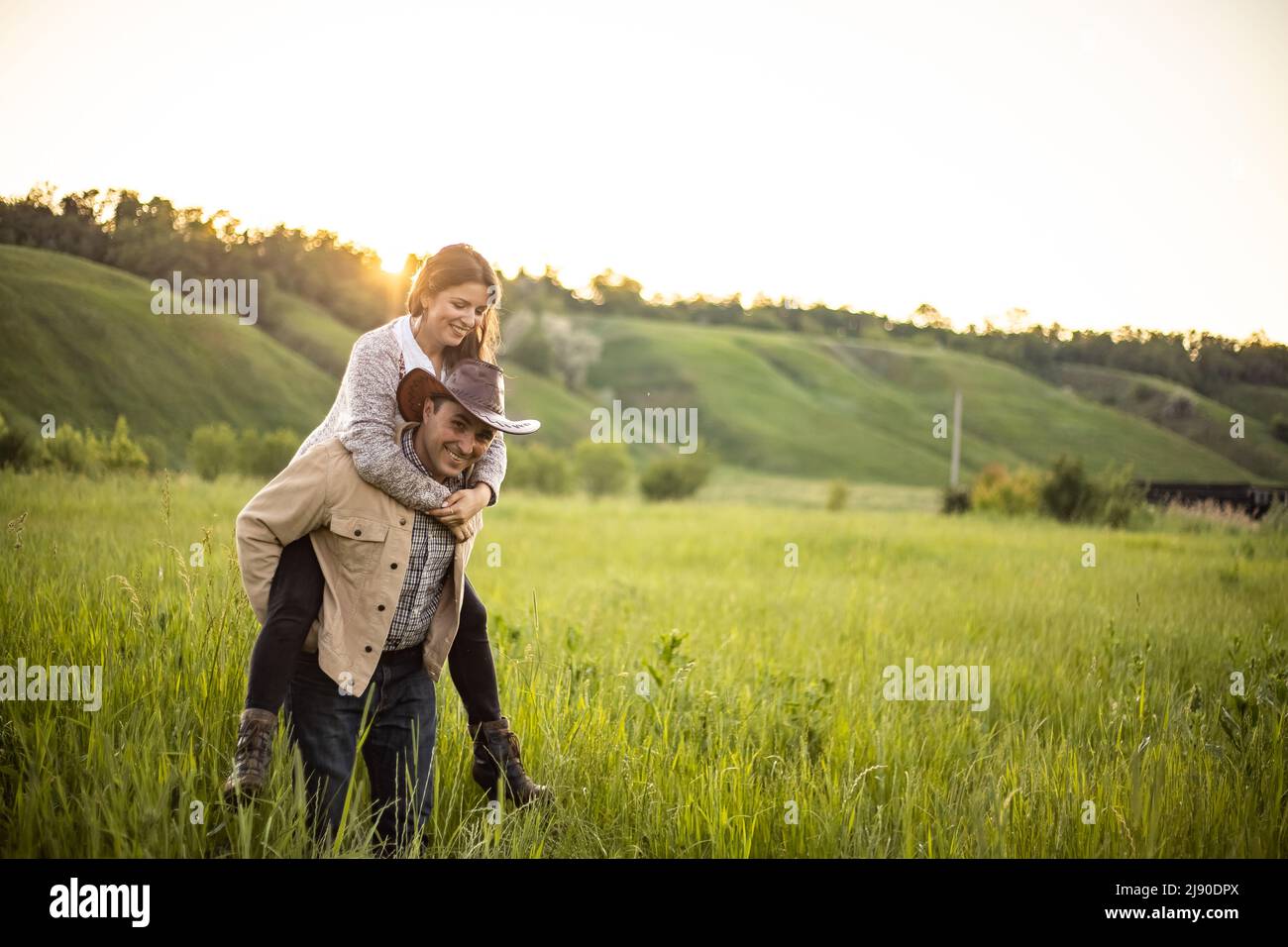 nice portrait of beautiful and young groom and bride outdoors Stock ...