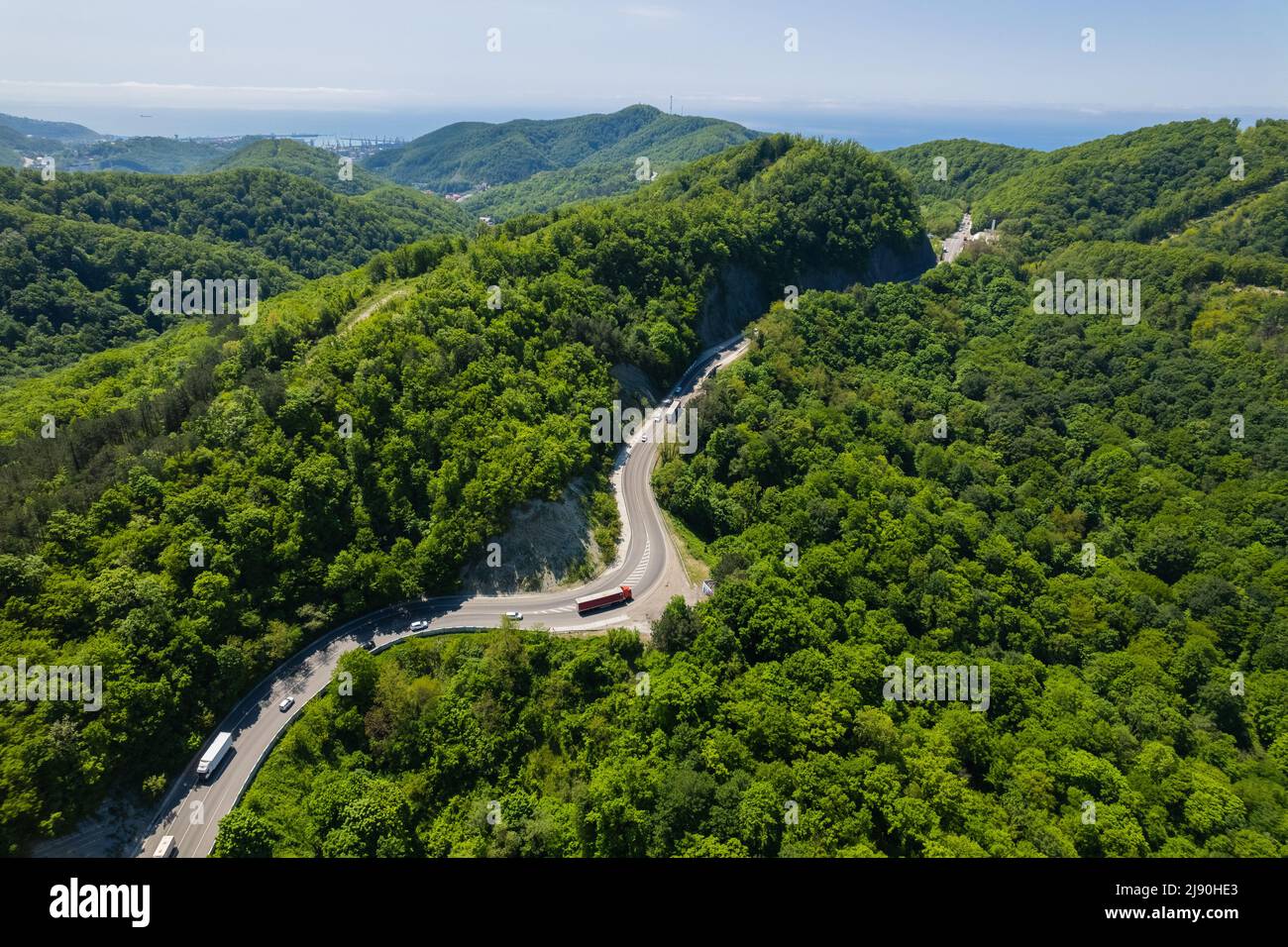 Aerial view of winding road from the high mountain pass. Great road ...
