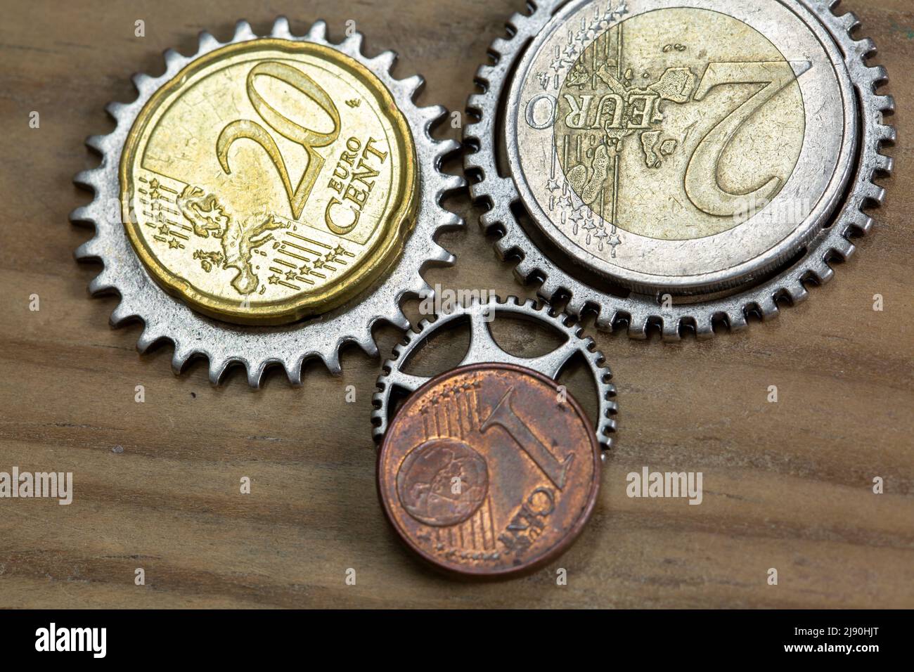 Money Coin and Gears, Money Concept Stock Photo - Alamy