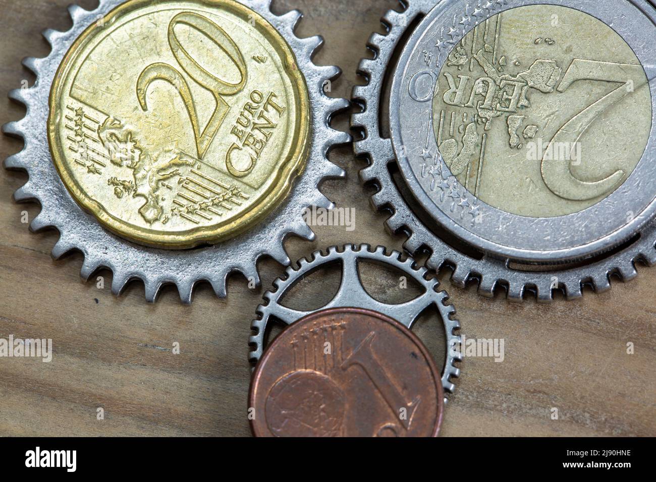 Money Coin and Gears, Money Concept Stock Photo - Alamy