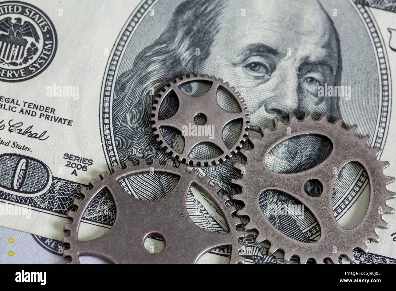 Money gears hi-res stock photography and images - Alamy