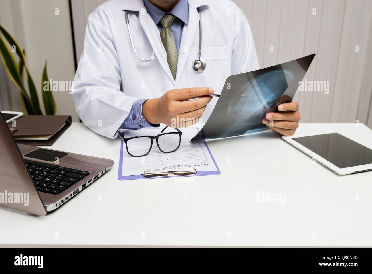 Medicine and health care concept. Doctor diagnose and analyze on x-ray ...