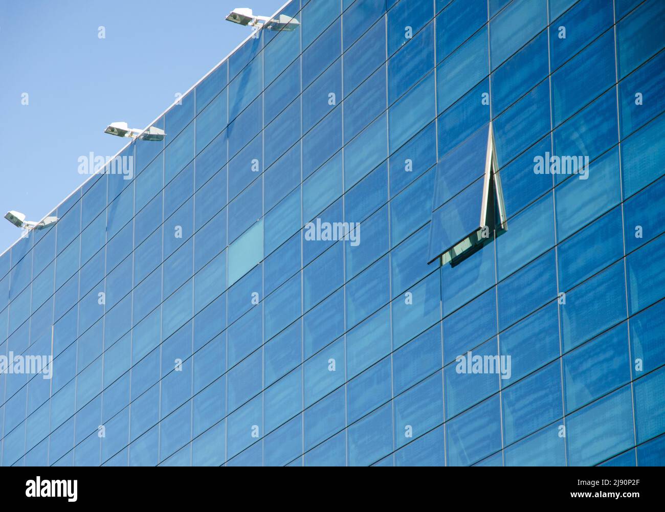 Glass facade of an office building. Only one window open Stock Photo ...