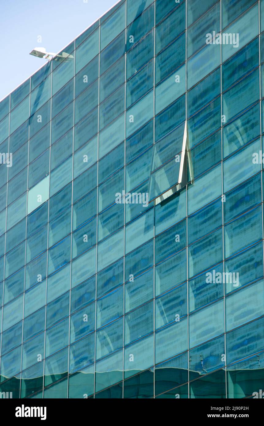 Glass facade of an office building. Only one window open Stock Photo ...