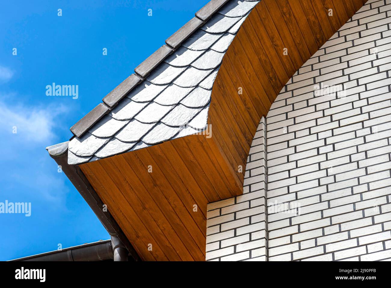 The church has a classic PVC soffit that imitates wood with a white ...