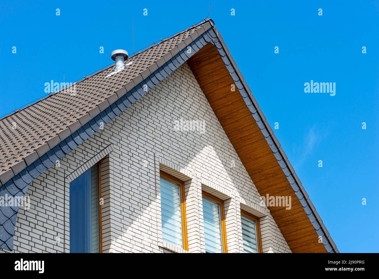 The church has a classic PVC soffit that imitates wood with a white ...