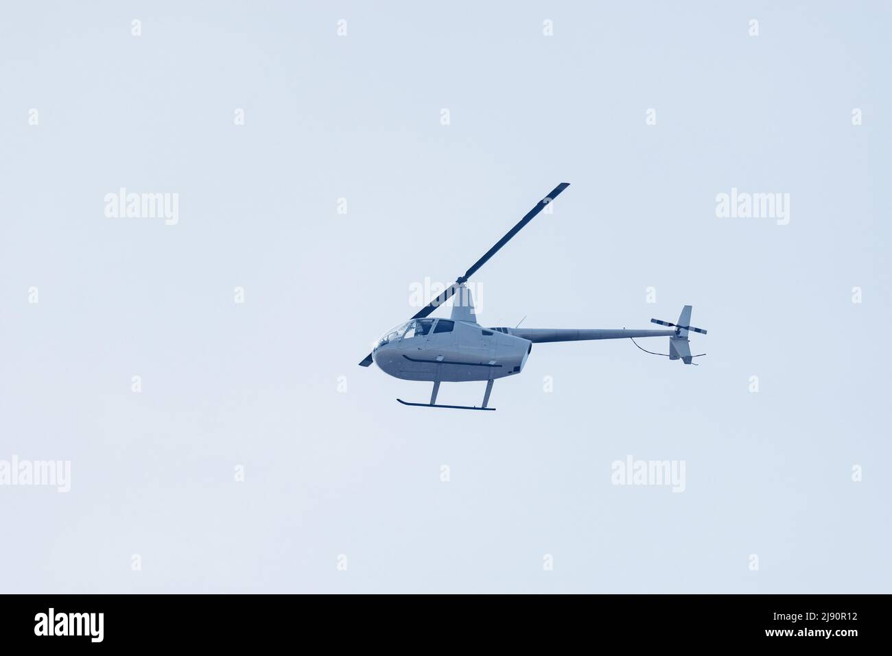Small private helicopter flying hi-res stock photography and images - Alamy