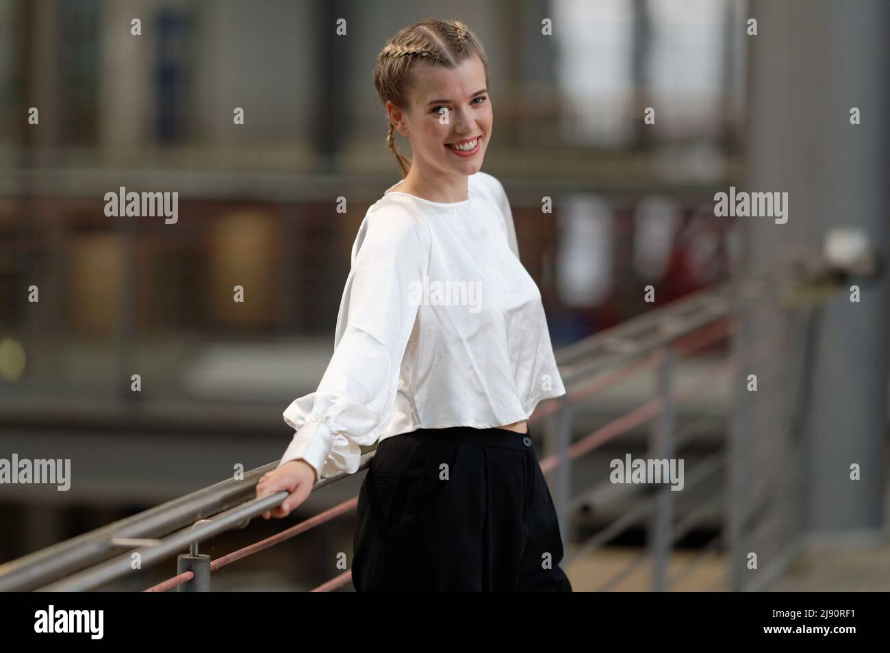 Cologne, Germany. 19th May, 2022. Actress Sina Zadra stands at a press ...