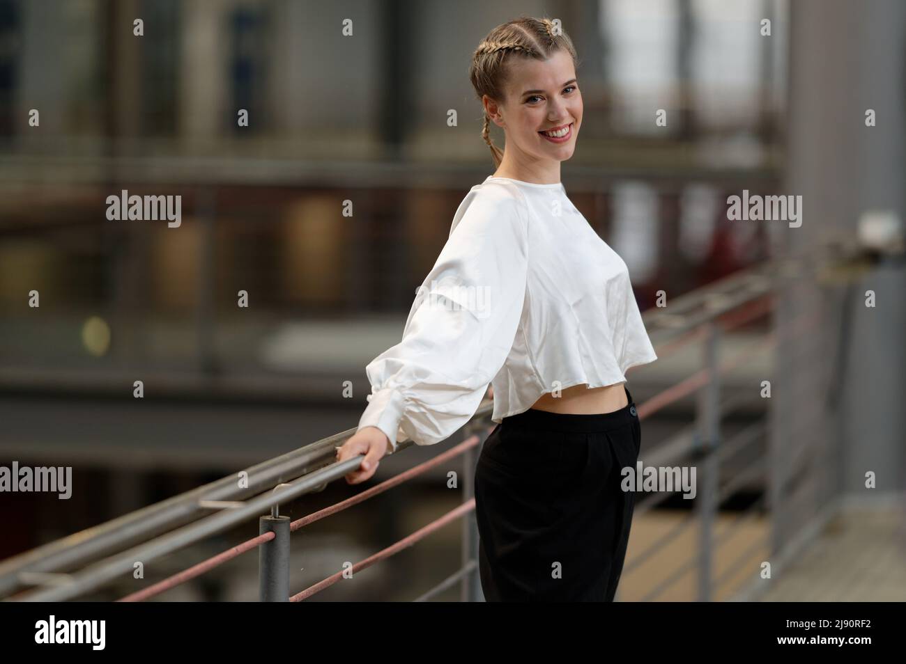 Cologne, Germany. 19th May, 2022. Actress Sina Zadra stands at a press ...