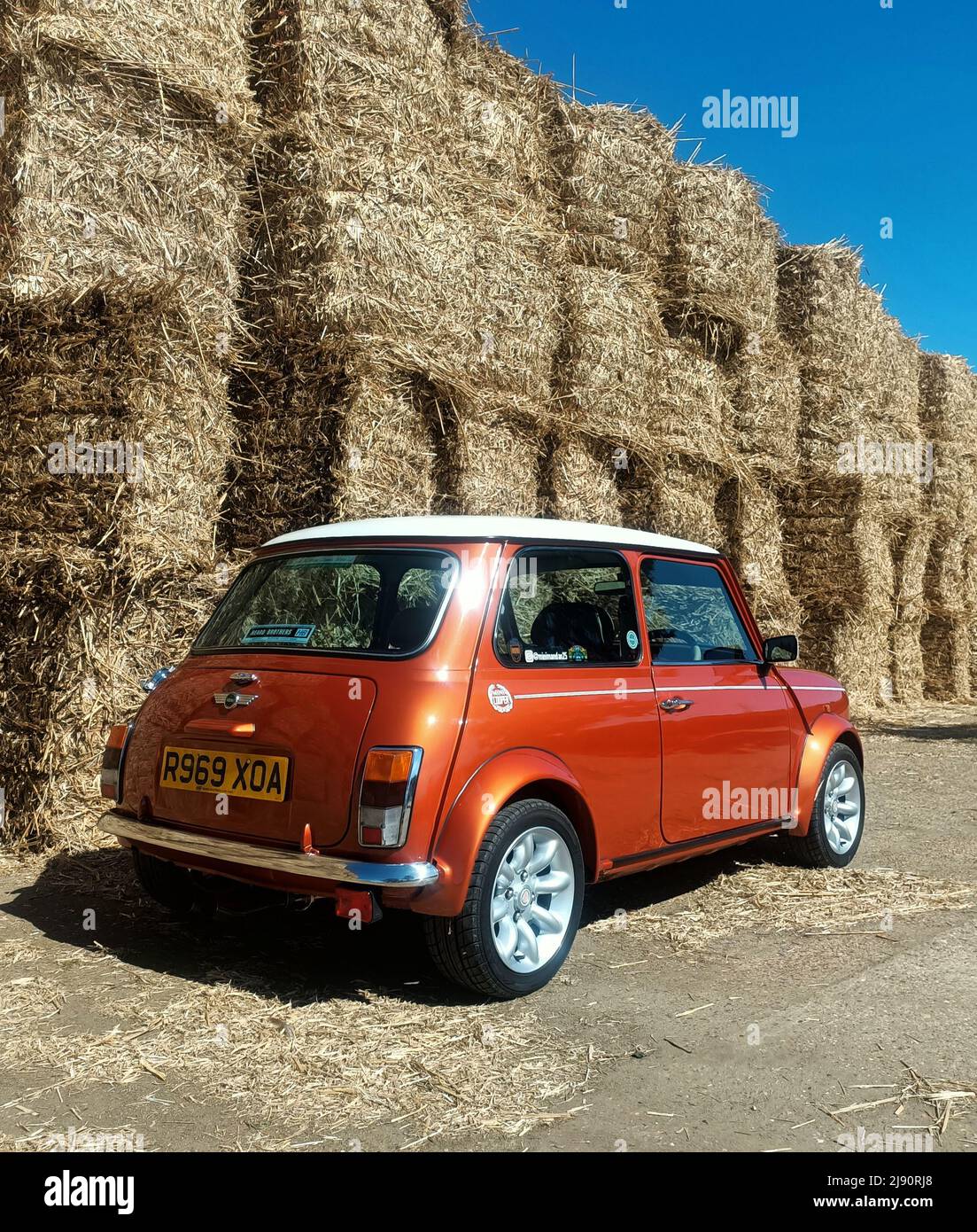 Volcano Orange Rover Mini Cooper Stock Photo - Alamy