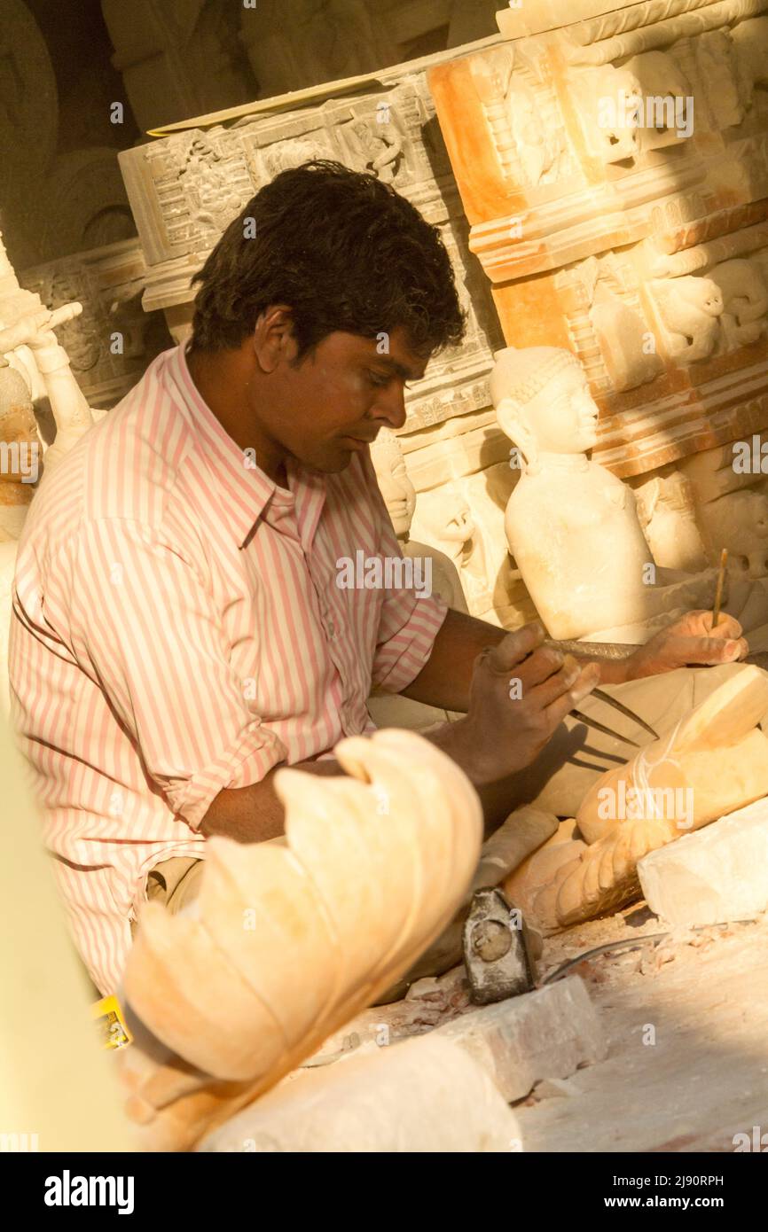 Statue man holding hammer hi-res stock photography and images - Alamy