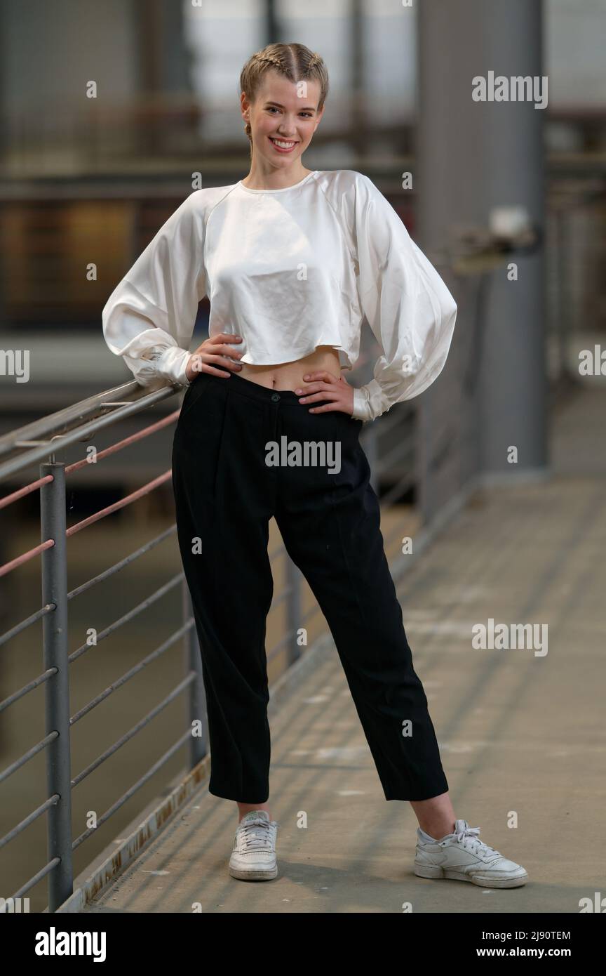 Cologne, Germany. 19th May, 2022. Actress Sina Zadra stands at a press ...