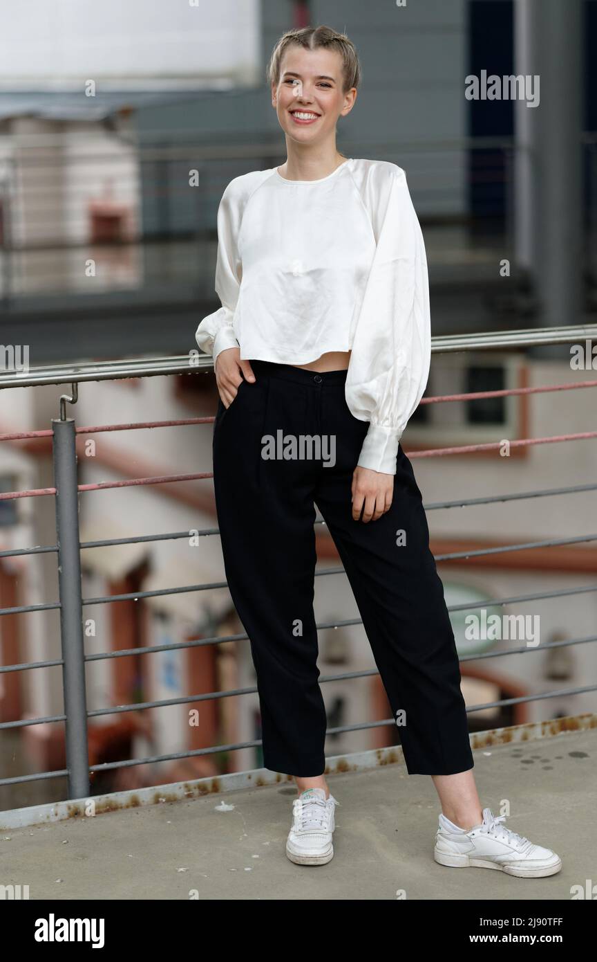 Cologne, Germany. 19th May, 2022. Actress Sina Zadra stands at a press ...