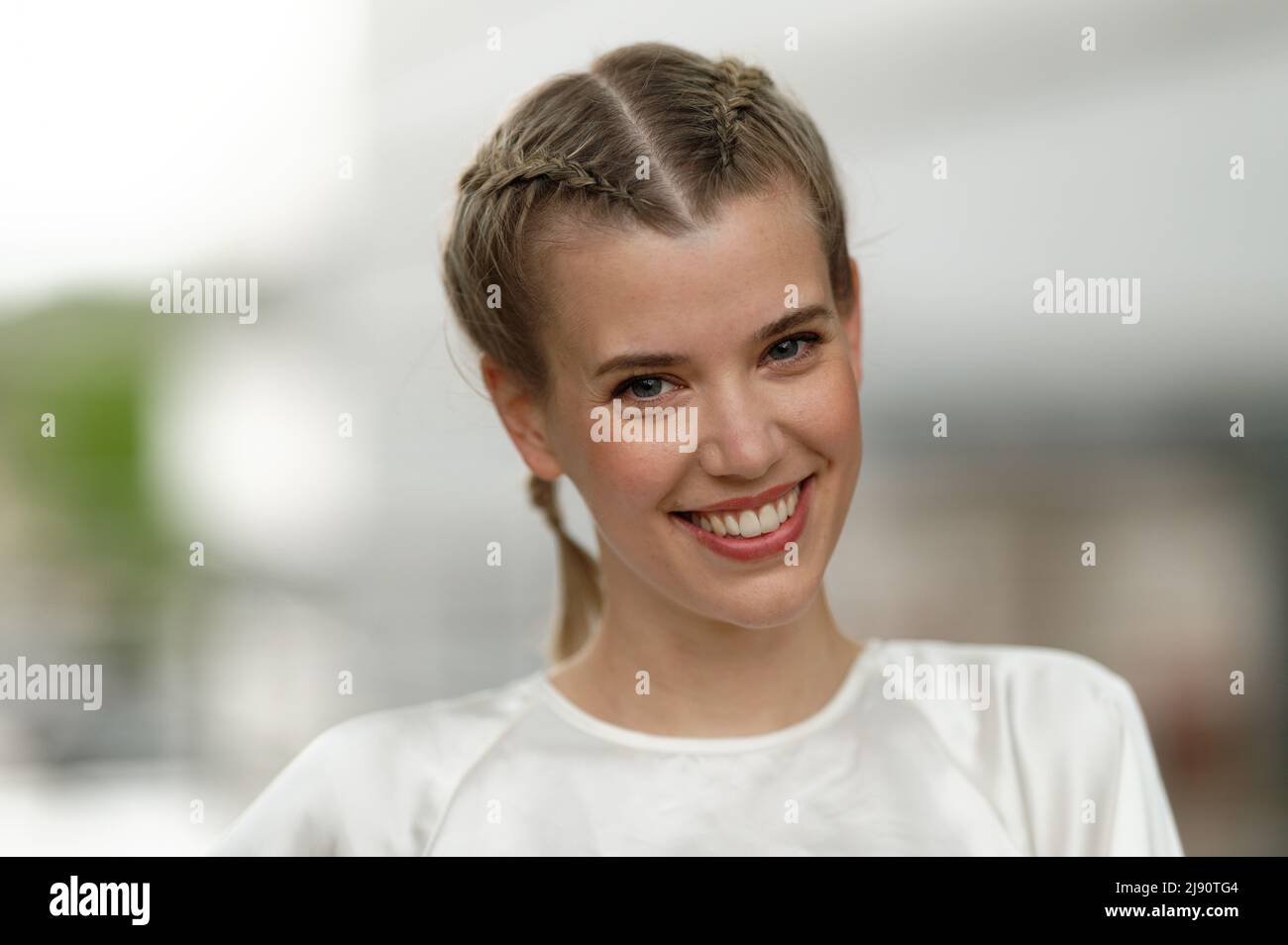 Cologne, Germany. 19th May, 2022. Actress Sina Zadra stands at a press ...