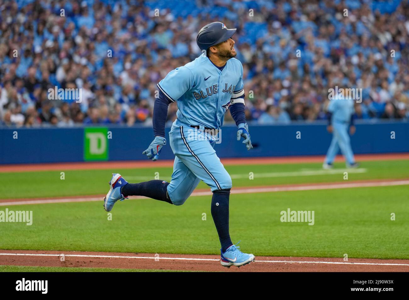 Toronto Blue Jay outfielder George Springer (4) runs for a base hit ...