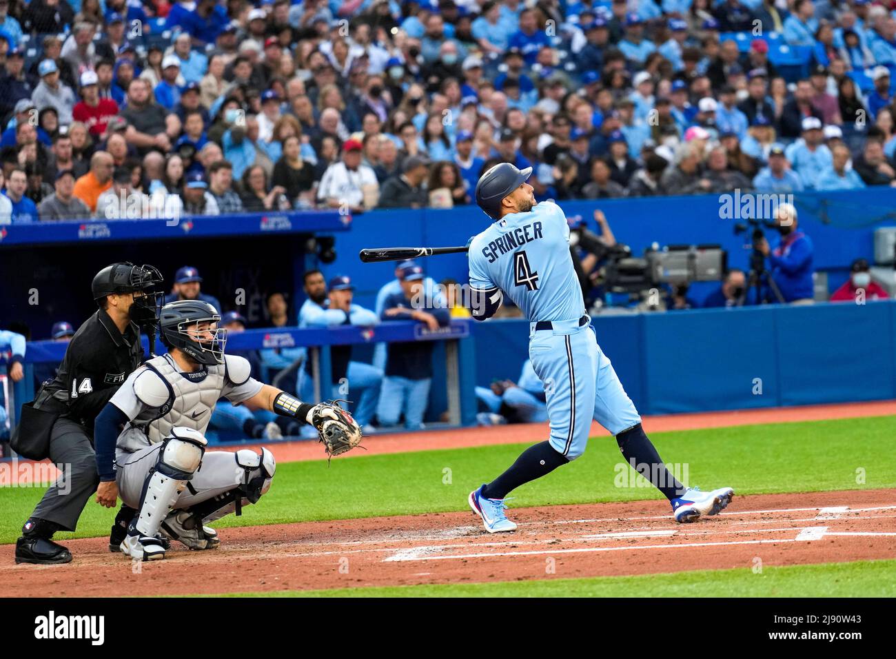 Toronto Blue Jay outfielder George Springer (4) at bat for a base hit ...