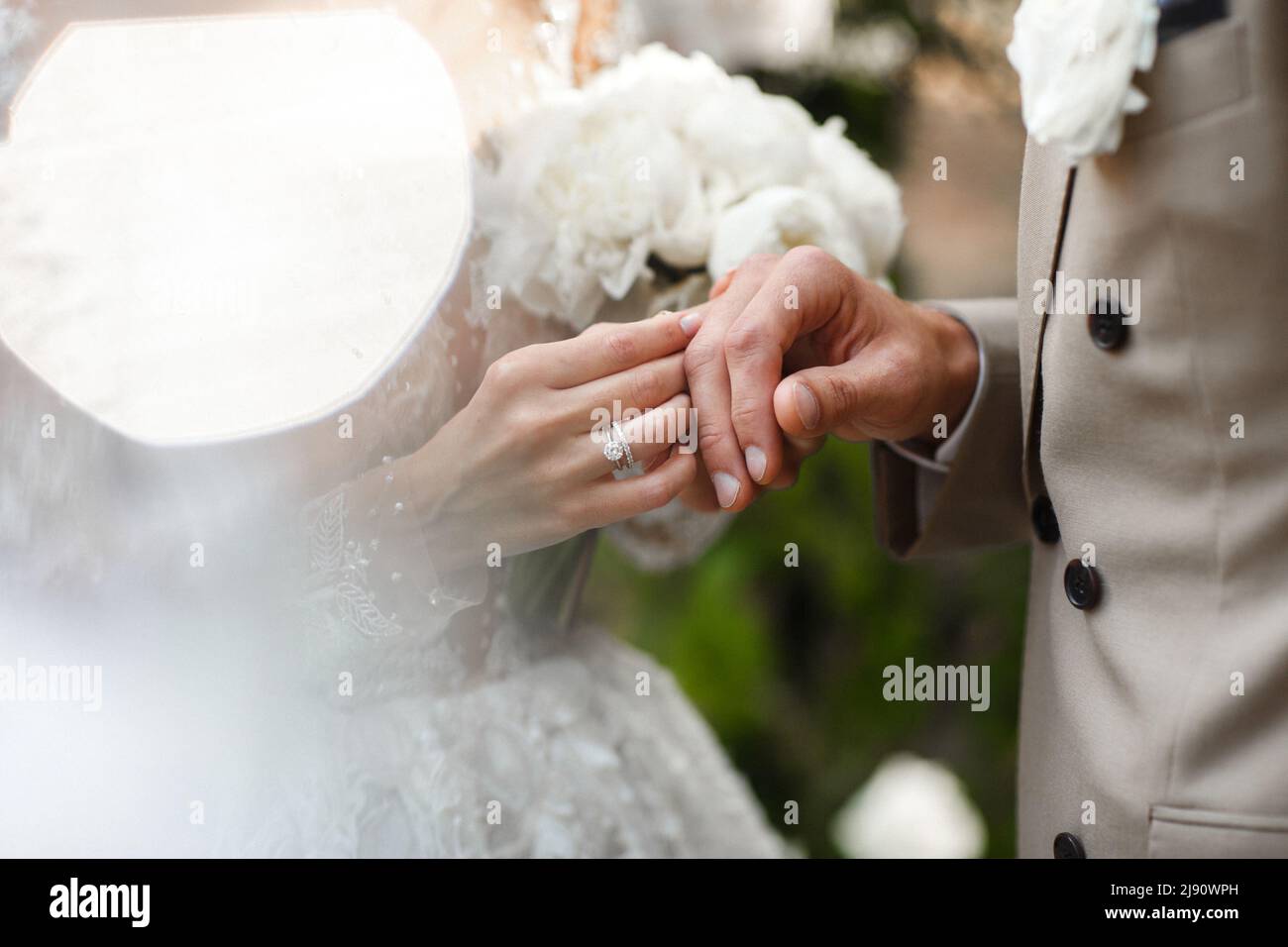 Closeup man wears wedding ring hi-res stock photography and images - Alamy